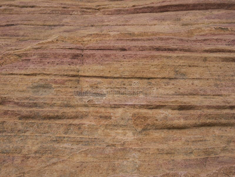 Rock Face with Coloured Lines and Sandy Surface Stock Photo - Image of ...
