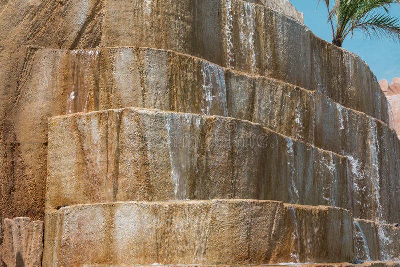 Rock Face Made of Steps with Water Falls Stock Image - Image of scenic ...