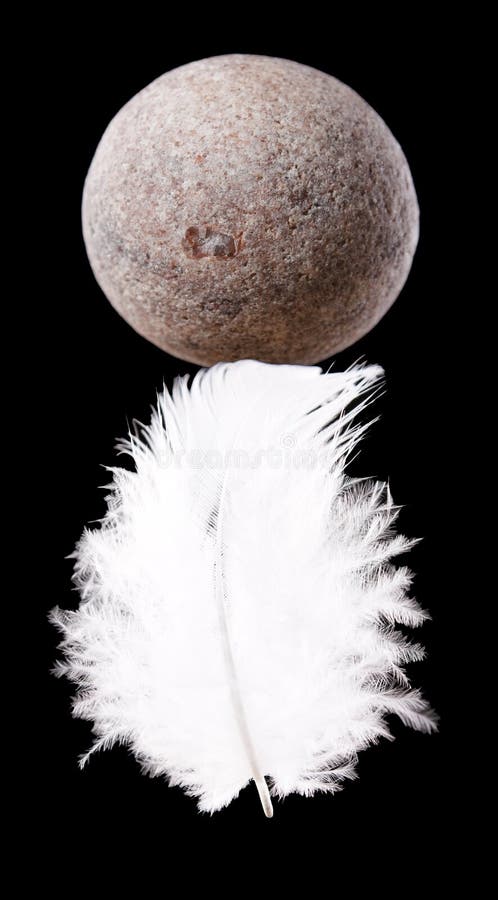 Rock and feather stock photo. Image of creation, equanimity - 9510938