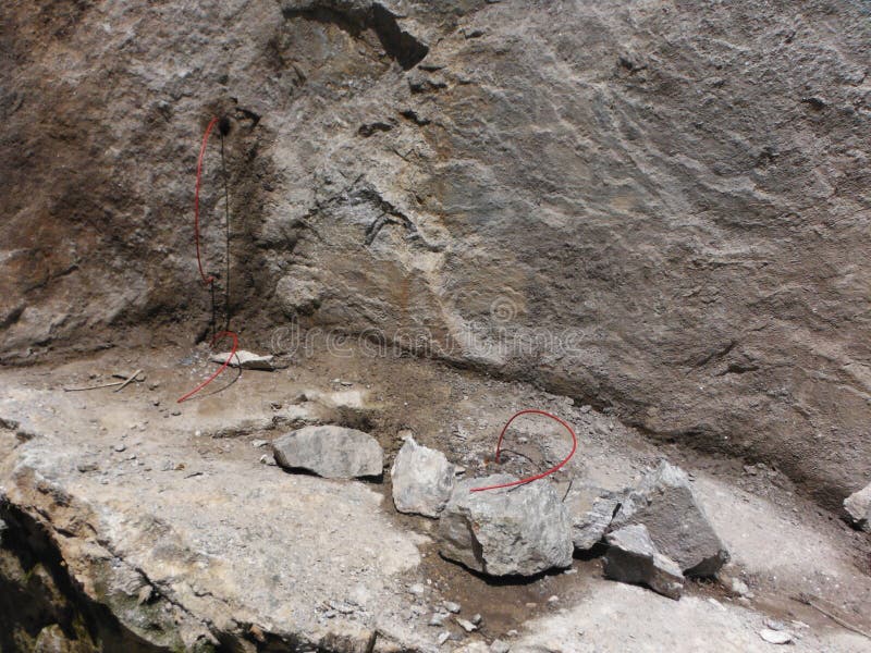 Dynamite Holes for Explosive Filing on a Mountain Rock Stock Photo ...