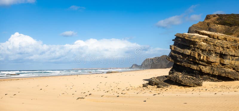 Rock Formation Along Sandy Beach Stock Photo - Image of cliff, ocean ...