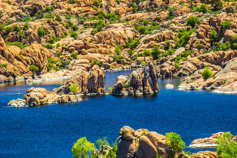 Rock Formation Islands in Blue Lake Stock Photo - Image of bushes ...
