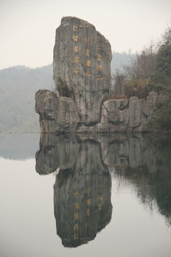 Inverted Reflection in Water Editorial Image - Image of landmark, rock ...