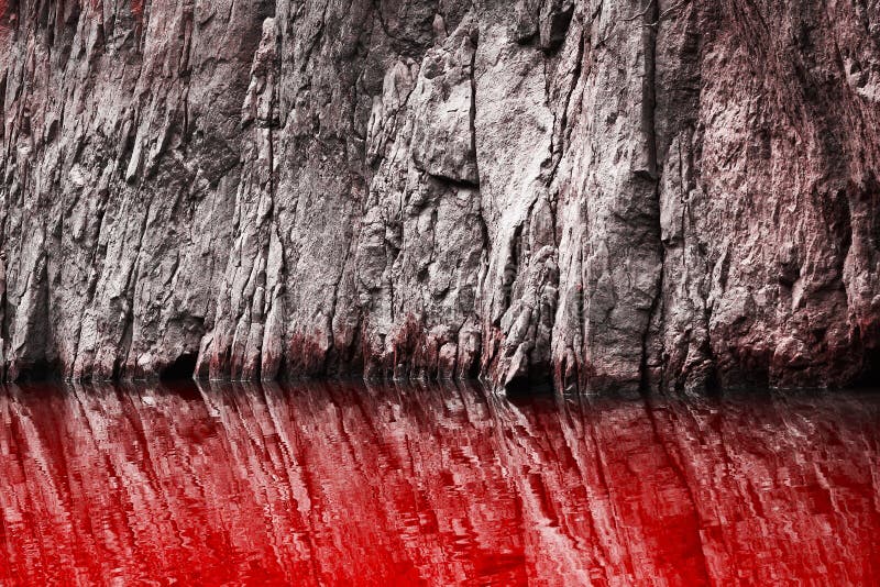 Rock Formation in the Reflection of Water. War Concept, Blood ...