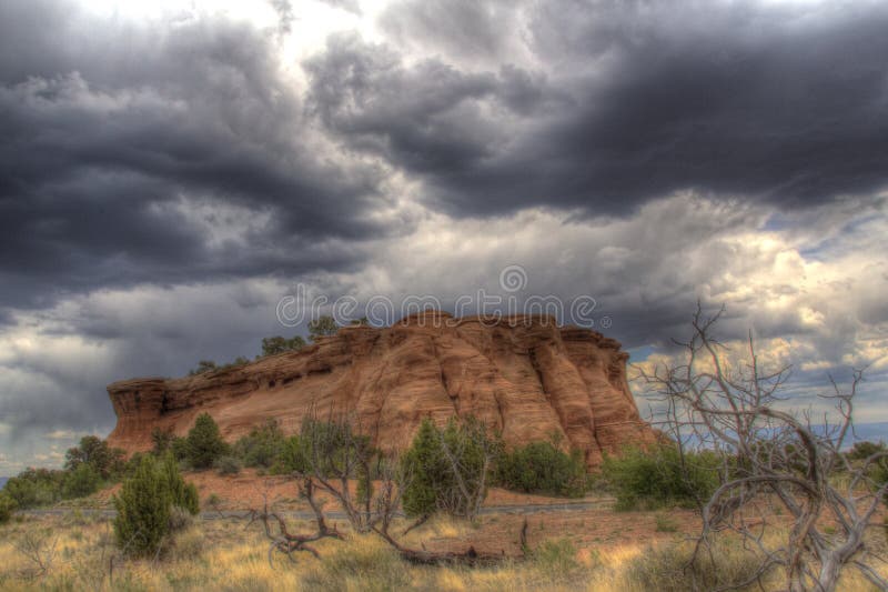 Rock Formation and Wood Under a Cloudy Sky in Colorado Stock Image ...