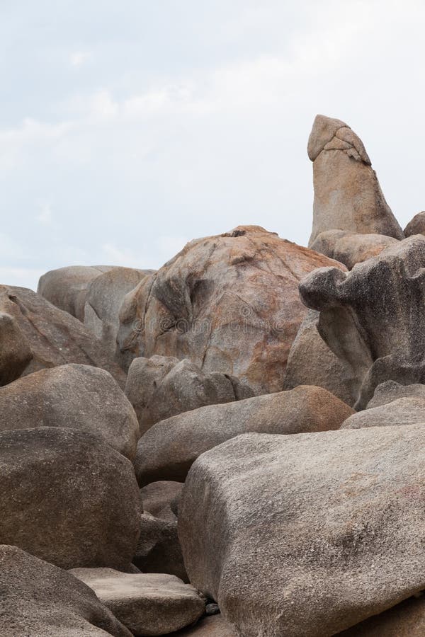 Rock formations on a beach stock photo. Image of eroded - 61630354
