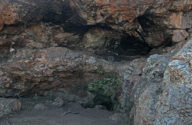 ROCK FORMATIONS FLANKING CAVE OPENING Stock Image - Image of colouring ...