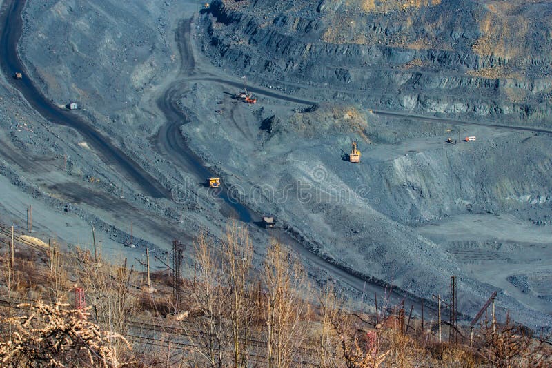 Rock Formations in Huge Quarries of Ore Together with Technique Stock ...