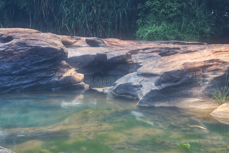 Rock formations in a river stock image. Image of formations - 175474151