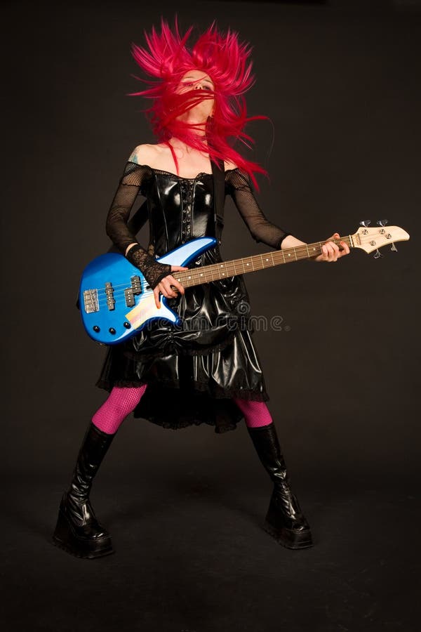 Rock girl shaking her head stock photo. Image of body - 5130360