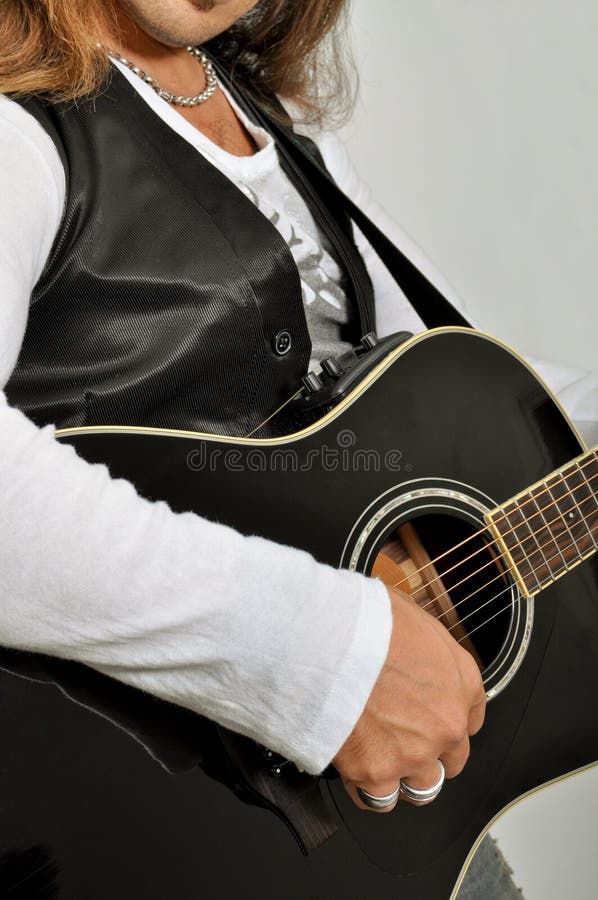 Rock guitarist stock image. Image of excited, earring - 24934711