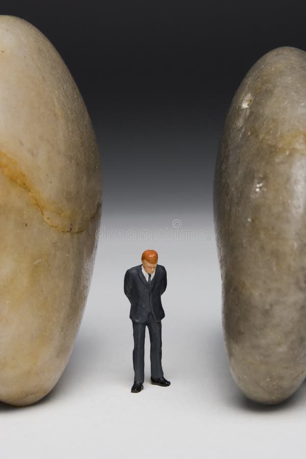 Between a Rock and a Hard Place Stock Photo - Image of meeting ...