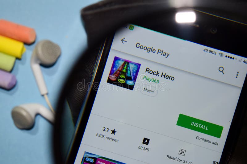 Rock Hero Dev App with Magnifying on Smartphone Screen Editorial Image ...