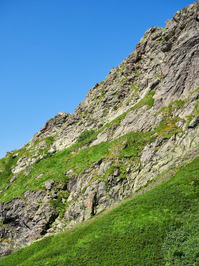 The Rock on a High Mountain Slope Stock Photo - Image of horizon ...