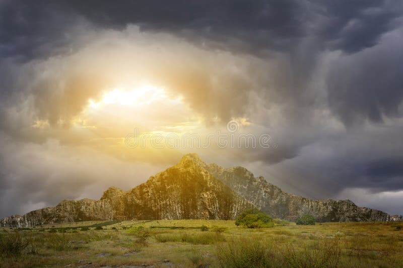 Rock hill and grass field stock image. Image of view - 270433205