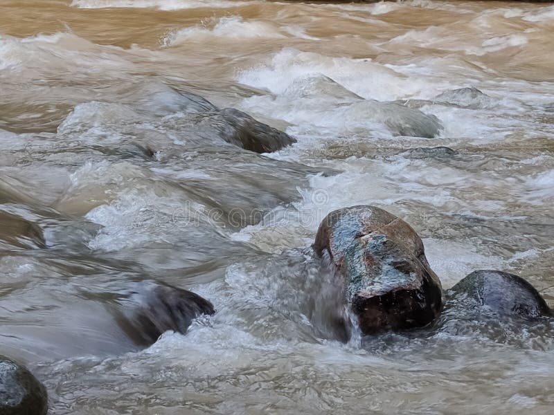 Rock Hit by Flowing Water Loksado Stock Photo - Image of rock, flowing ...
