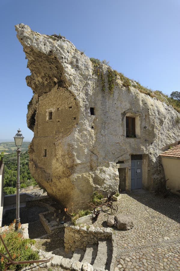Rock house stock photo. Image of domus, rock, italy, mountain - 12990168