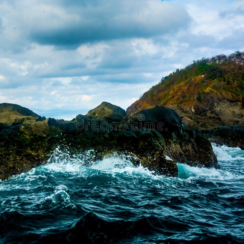 Rock Island Over Scenic Blue Sea Water Stock Photo - Image of resort ...