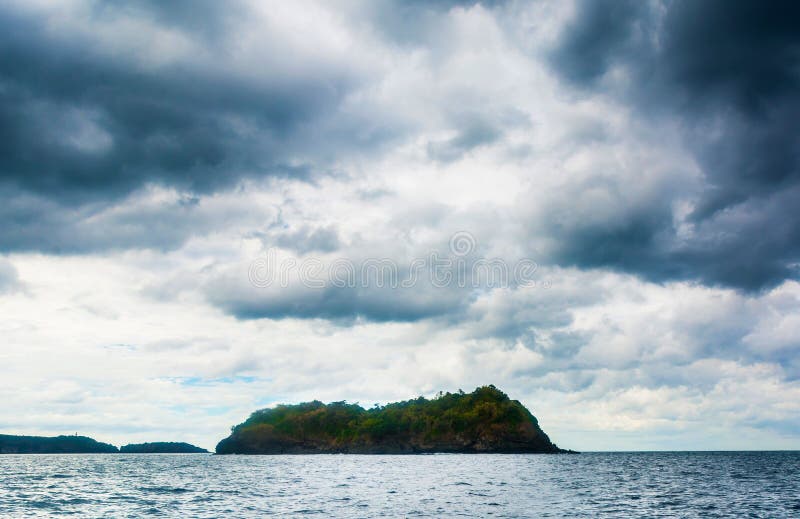 Rock Island Over Scenic Blue Sea Water Stock Image - Image of ocean ...