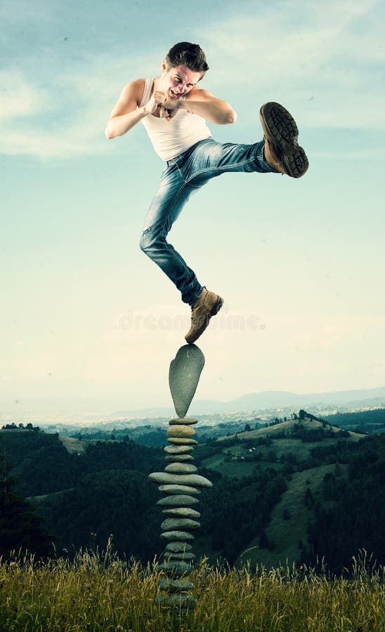 Rock kick stock photo. Image of stability, sportsman - 96942584