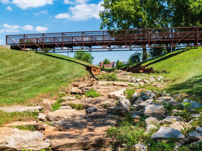Rock Lined Dry Stream Under Bridge Stock Photo - Image of park ...
