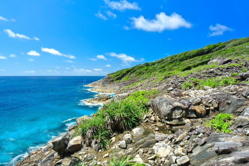 Rock Mountain with Blue Ocean on Blue Sky Stock Image - Image of ...