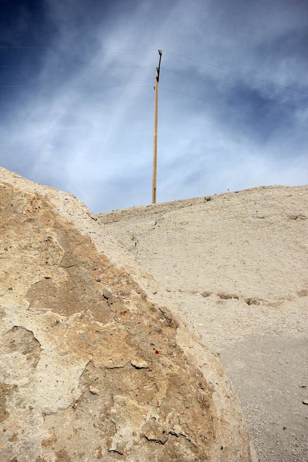 Rock and old electric pole stock image. Image of connection - 188900365