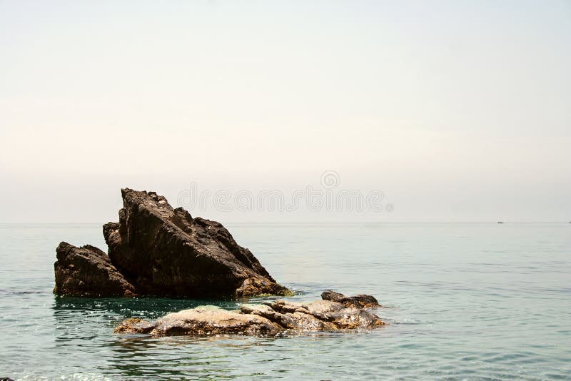 Rock Outcrop In Ocean Water Picture. Image: 88262552
