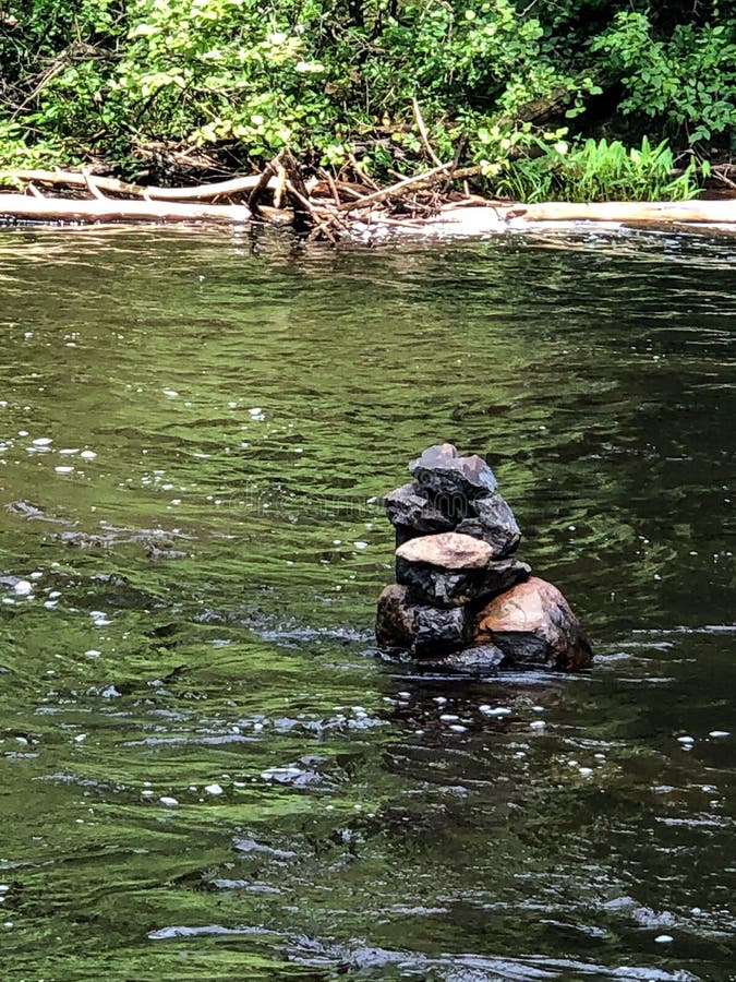 Rock Pile in Middle of River Stock Photo - Image of stones, rocks ...