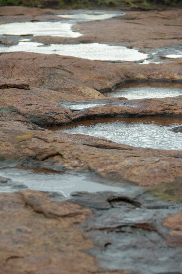 Rock Pool with Ripples from Rain Stock Image - Image of river, movement ...
