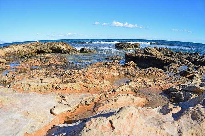 Rock Pools-Fisheye Lens Rugged Beach Terrain Stock Image - Image of ...