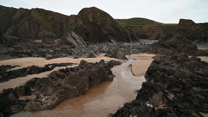 Rock Pools on a Sandy Beach at Low Tide Stock Video - Video of seaside, layers: 350276617