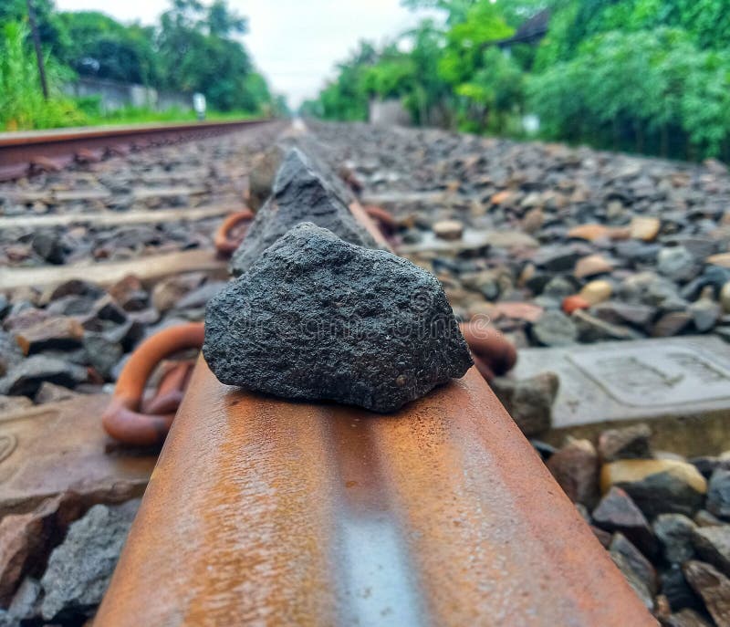 Rock on the rail stock photo. Image of rail, rock, atas - 203361682