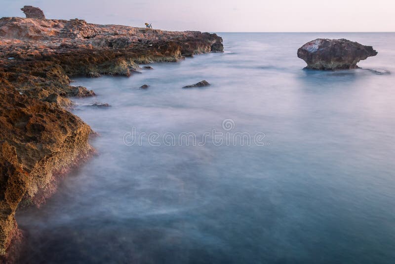 Rock reef in the sea stock image. Image of orange, coastal - 35135257