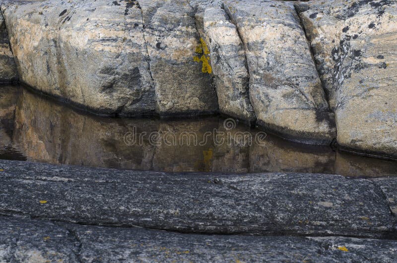 Rock in reflection stock image. Image of rock, reflection - 54341357