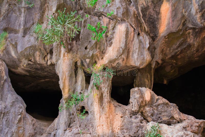 Rock reliefs Thai stock photo. Image of maitreya, ancient - 77450066