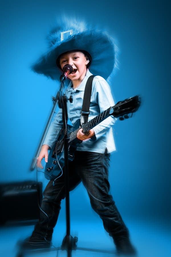 Rock and Roll boy stock photo. Image of instrument, stage - 23598188