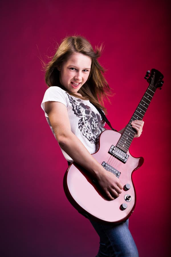 Rock and Roll girl stock photo. Image of hair, solo, musician - 24697920