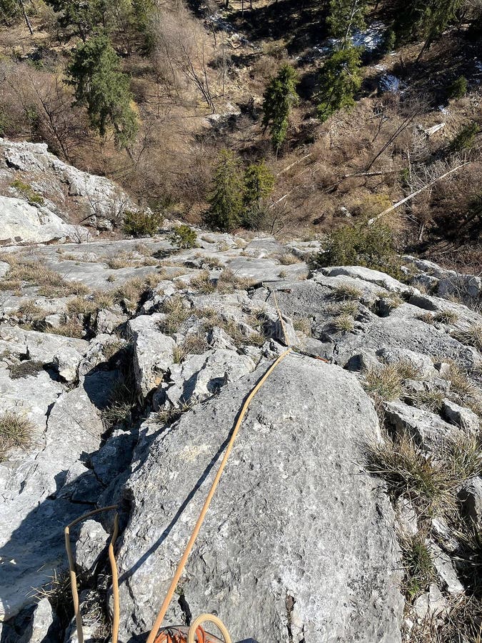 A rock with ropes to climb stock photo. Image of outdoors - 215164468
