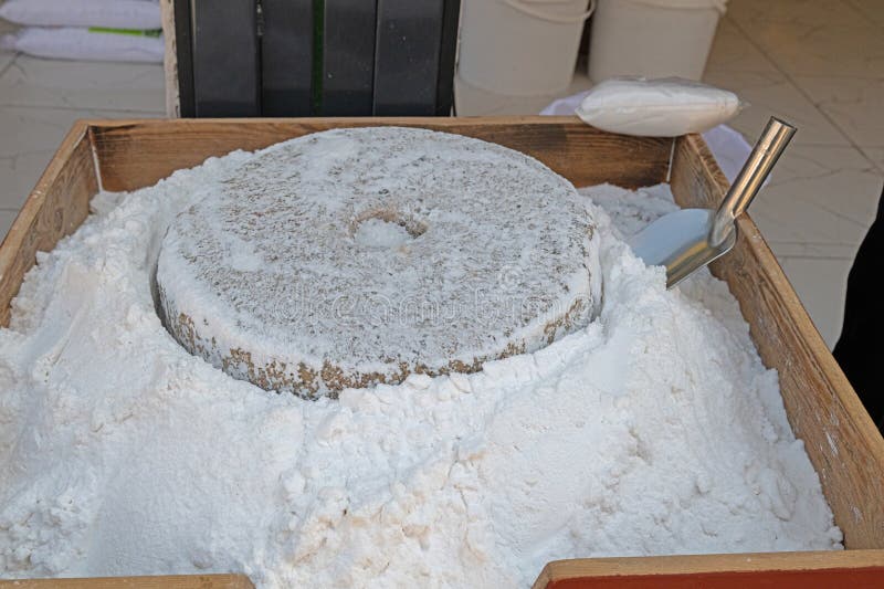 Rock Salt Ground in a Stone Mill Stock Photo - Image of ingredient ...