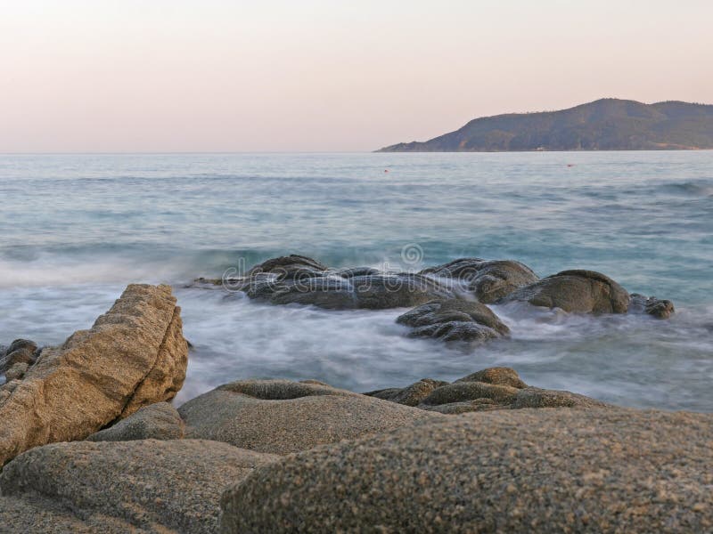 Rock in the Sea Long Exposition Stock Image - Image of horizon, beauty ...