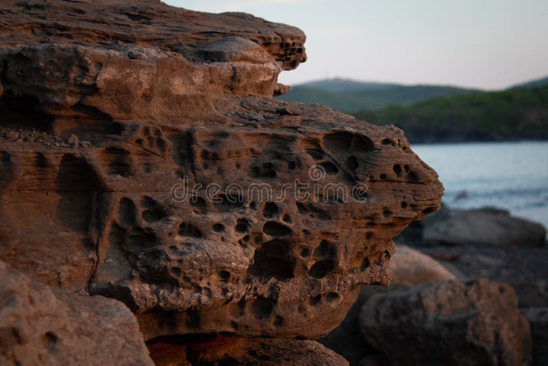 Rock and Sea in Morning Sun Rays Stock Image - Image of seascape ...