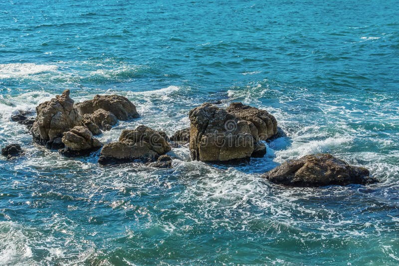 Rock and sea waves stock photo. Image of mediterranean - 127246932