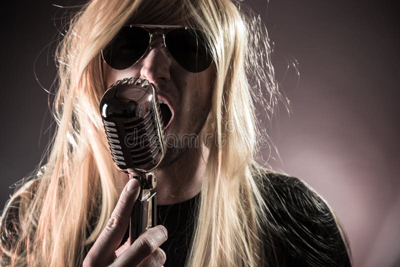 Rock Singer with Retro Microphone Stock Photo - Image of club, glitter ...