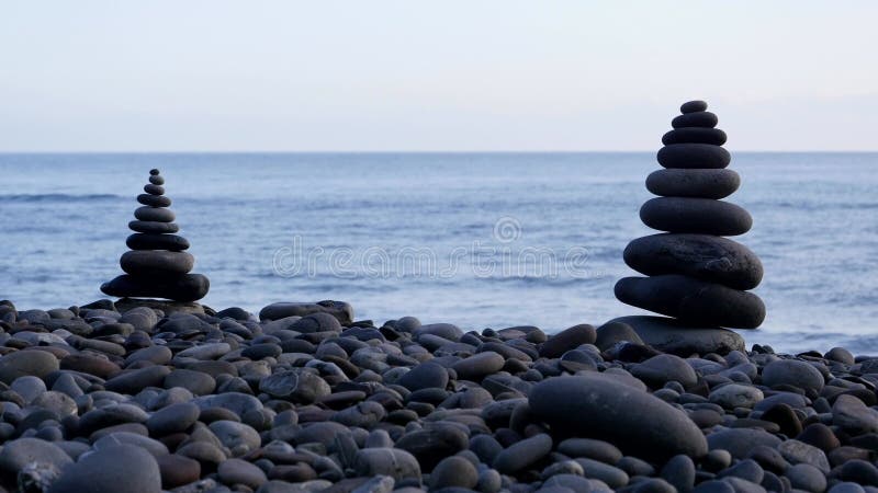 Rock Stack Balance and Harmony on Sea Beach with Evening Ambient Light ...