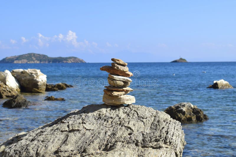 Rock Stack beside the Ocean on a Calm, Sunny Day Stock Photo - Image of ...