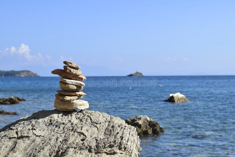 Rock Stack beside the Ocean on a Calm, Sunny Day Stock Image - Image of ...