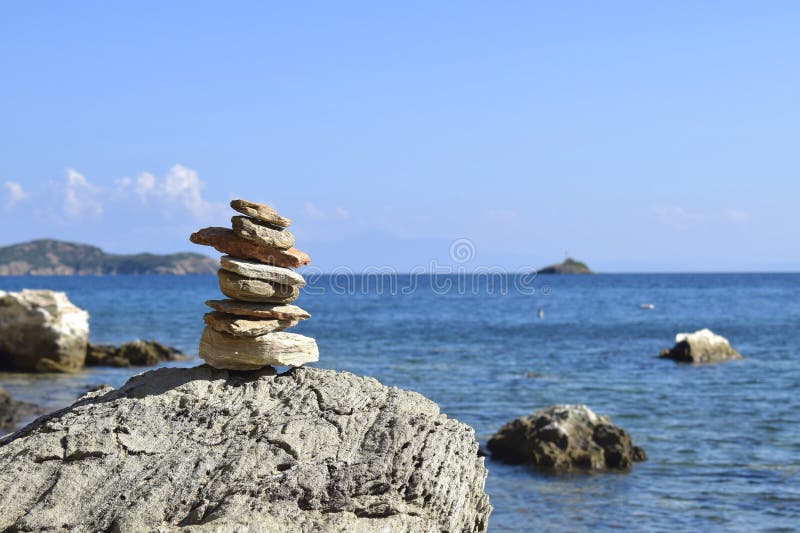 Rock Stack beside the Ocean on a Calm, Sunny Day Stock Photo - Image of ...