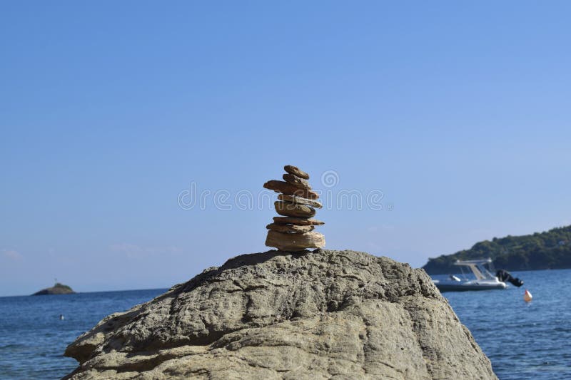 Rock Stack beside the Ocean on a Calm, Sunny Day in Greece Stock Image ...