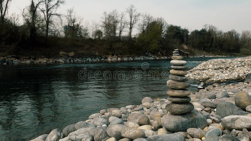 Rock Stacking on the River stock video. Video of river - 245096473